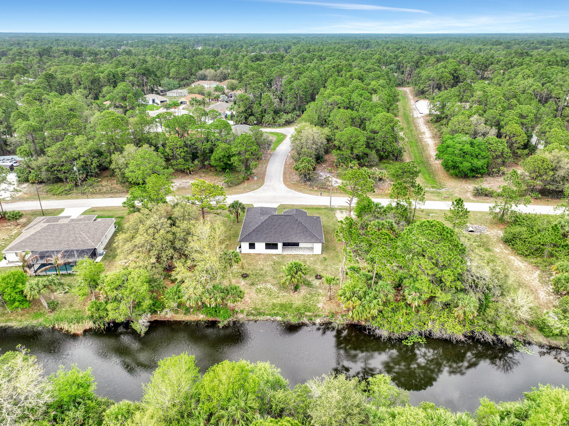 Spectacular "2022" Custom Built Canal Front Home