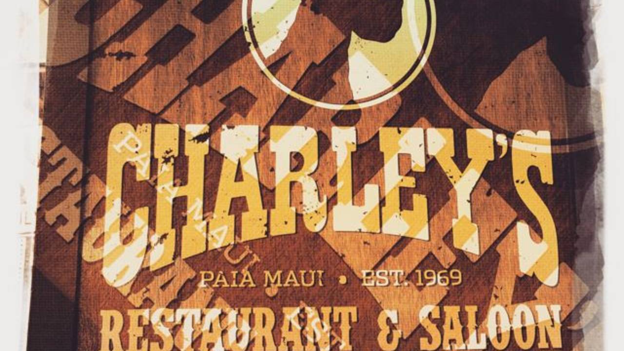 Willie Nelson's giant guitar on display at Charley's, P